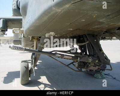 Close-up view of the M230 chain gun on an AH-64D Apache helicopter ...