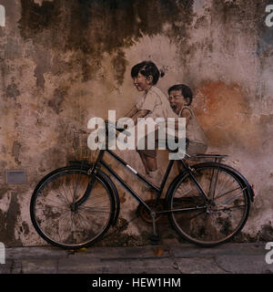 Two Kids on a Bicycle mural by Ernest Zacharevic, Lebuh Armenian (Armenian Street), old Colonial ...