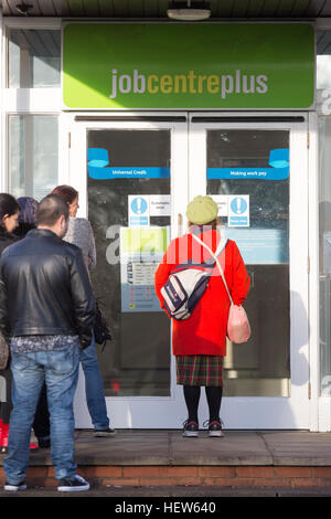People queuing to go into the job centre in Cambridge Stock Photo - Alamy