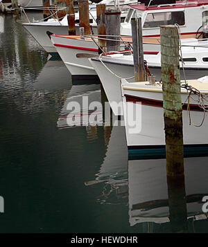 This image depicts various nautical equipment, including buoys, cleats ...