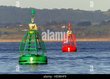 Port side red marker buoy. International shipping navigational aid ...