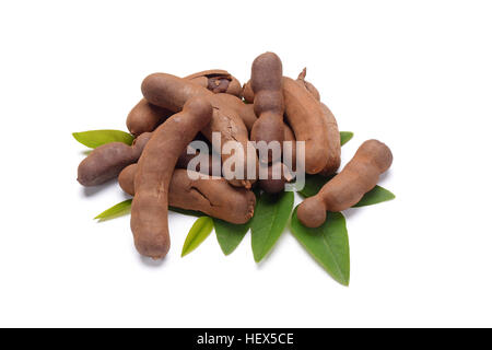 Tamarind fruit with leaf and seed isolated on white background with ...