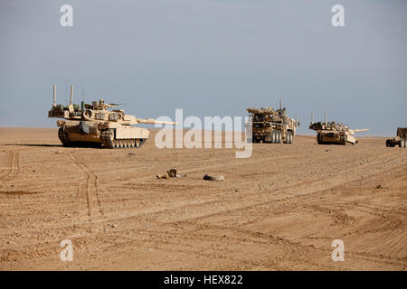 A Marine tank crew moves through Helmand Province in an M1A1 Abrams ...