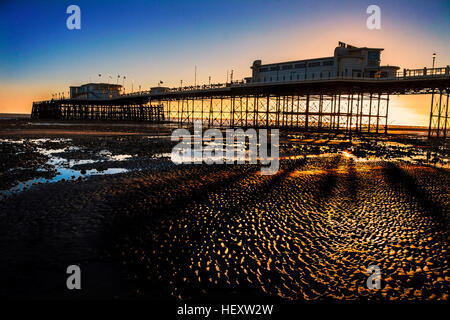 Worthing pier and beach at sunset on a cold winters day West Sussex ...