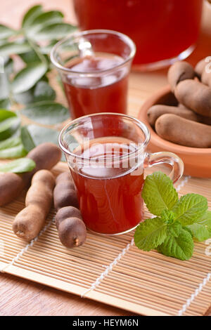 delicious drink tamarind with mint leaves Stock Photo - Alamy