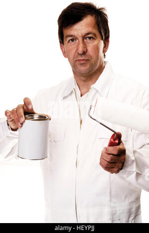 Paint can,roller and brush on the table. Items for home or office ...