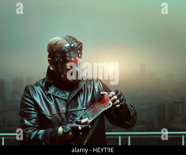 Bloody butcher after hunting Stock Photo - Alamy