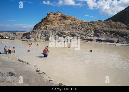 Tourist Enjoying a Volcanic Mud Bath during Hiking Trip on the ...