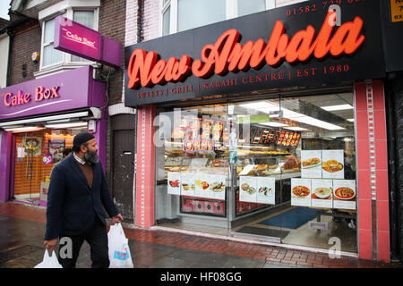 Asian Shops & shoppers in Bury Park area of Luton Stock Photo - Alamy