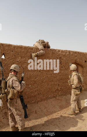 Members of 1st Battalion, 9th Marines take a brief break to eat during ...