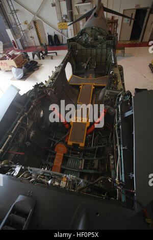 The inside of an AV-8B Harrier with the Pegasus engine removed. The ...