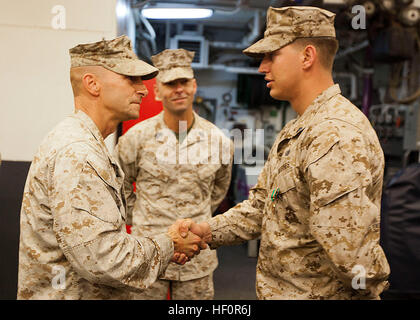 Col. Matthew St. Clair, left, 26th Marine Expeditionary Unit commanding ...