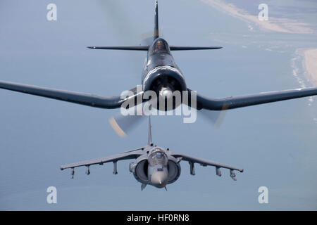 An F4U Corsair and AV-8 Harrier perform a legacy flight at the MCAS ...