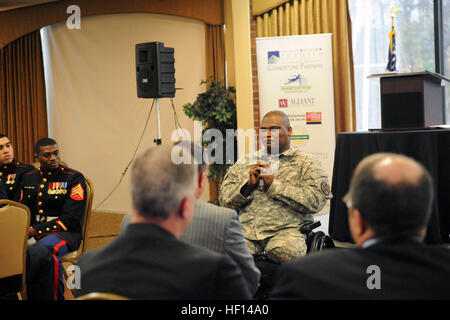 Col. Gregory D. Gadson, garrison commander, Fort Belvoir, gives a ...