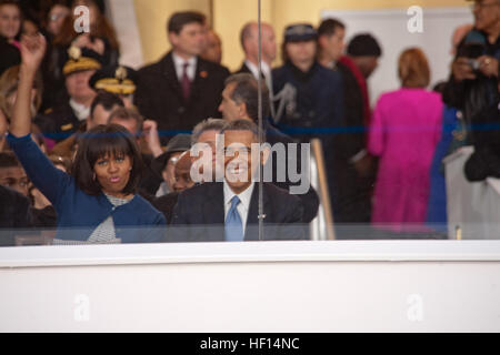 President Barack Obama and guests observe the inauguration parade from ...