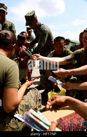 Armed Forces of the Philippines (AFP) service members conduct a ...