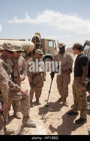 Members of a British explosive ordnance disposal (EOD) team disembark ...