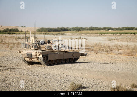 A Marine Corps M-1A1 Abrams main battle tank equipped with a mine ...