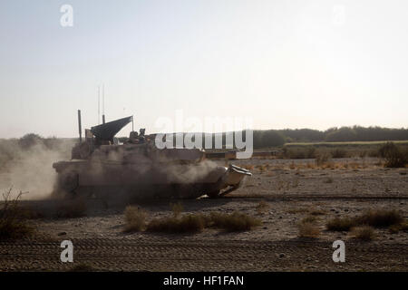 A Marine Corps M-1A1 Abrams main battle tank equipped with a mine ...