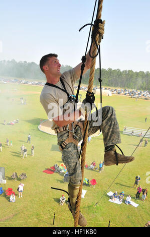 Staff Sgt. Jeremiah Waggoner ascends the rope during the prusik climb ...