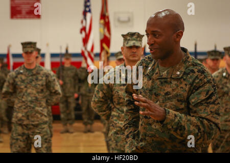 Lieutenant Col. James A. Ryans II (left) congratulates the new ...