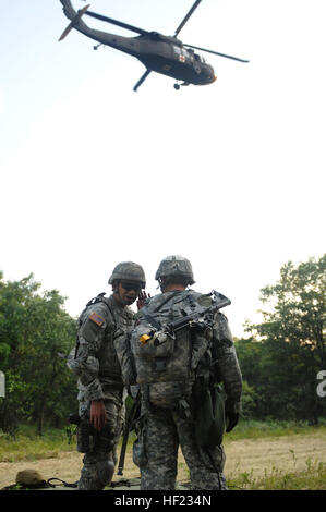Soldiers from Headquarters Company, 168th Infantry, of the 42nd ...