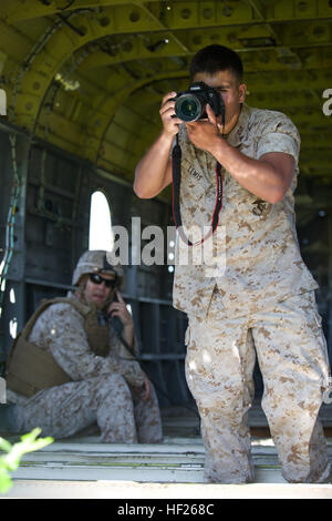 U.S. Marine Corps radio operators use communication gear during a mock ...