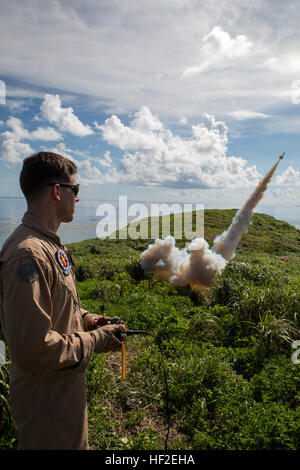A GTR-18 missile, better known as a "Smokey SAM," launches during a ...