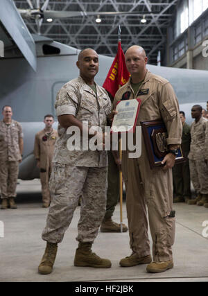 Col. Brian Cavanaugh, left, presents the Chief of Naval Operations ...