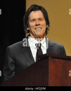 Actor Kevin Bacon speaks on stage during the 3rd Annual LOVE ROCKS NYC ...