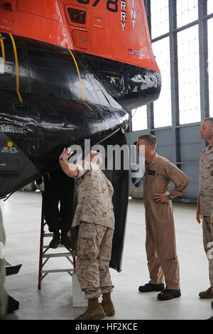 Lt. Col. Thomas Bedell, left, Col. Thomas R. McCarthy Jr., center, and ...