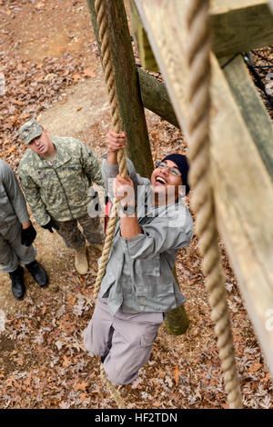 Tarheel Challenge Academy cadets climb a ladder at the obstacle course ...