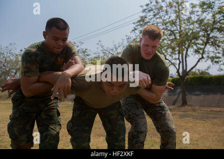Marines from the 3rd Military Police Battalion conducting an illage ...
