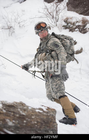 A Soldier attending the U.S. Army Mountain Warfare School in Jericho ...