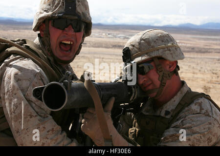 Sgt. Brian E. Willett, anti-tank missileman (assistant gunner), left ...