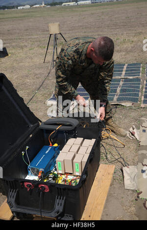 A tactical air navigation (TACAN) system van is positioned facing ...