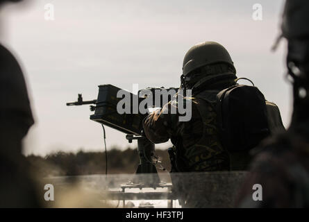 A Dutch Marine with the Fast Raiding Intercepting Special Forces Craft ...