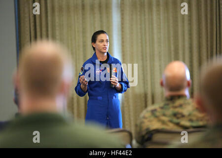 Lt. Col. Nicole “Duke” Mann speaks to Marines during a seminar aboard ...