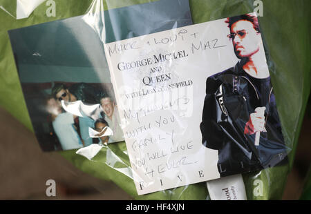 Tributes to George Michael outside his house in Highgate, north London ...