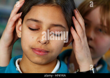 Students in class 7a at John Cabot Academy, Bristol, UK, using massage ...