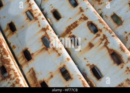 Rusting beams / stantions of an industrial racking / shelving system ...