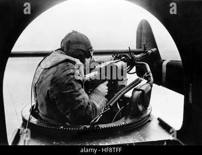 German machine gunner in an airplane during first days of World War 2 ...