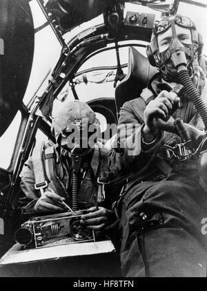 The Nazi propaganda image shows the crew of a combat plane wearing ...