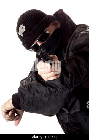 Man robber in balaclava pointing with gun Stock Photo: 120489263 - Alamy