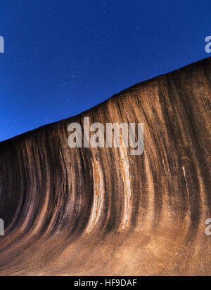 The flared slope of Wave Rock. The black stripes are caused by algae ...