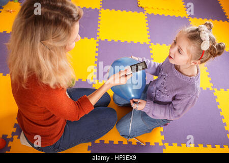 Child giving an interview to a journalist Stock Photo - Alamy