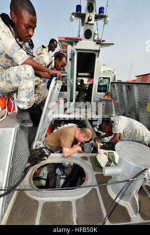 Coastal Riverine Squadron 4 assists personnel in donning body armor ...