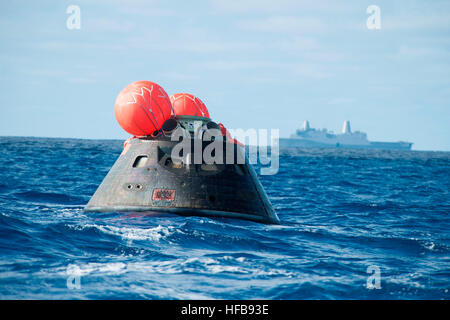 Crew module after splash down in the Pacific Ocean with the Crew Module ...
