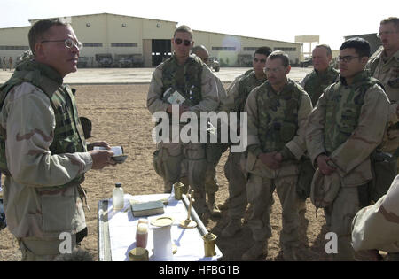 Camp Rhino, Afghanistan (Dec. 2, 2001) -- A bullet-riddled tower stands ...