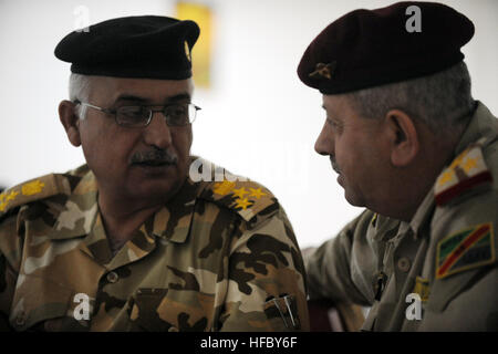 U.S. Army and Iraqi police personnel meet prior to a joint sports day ...